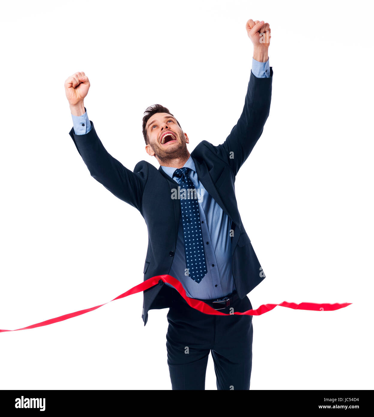 Businessman happy with win Stock Photo - Alamy