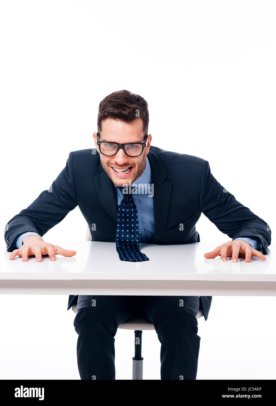 Greedy young businessman Stock Photo - Alamy