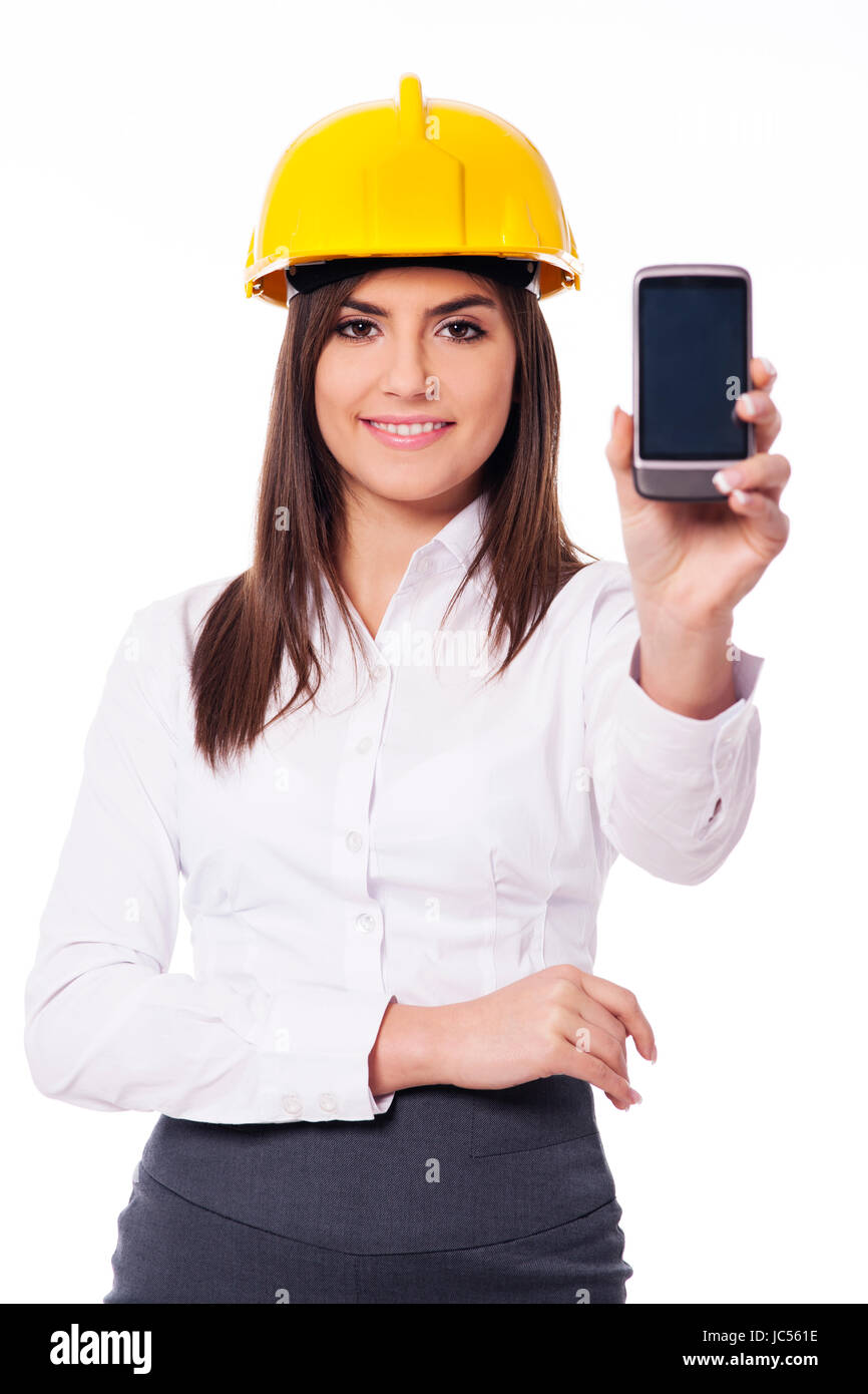 Young engineer presenting a smart phone Stock Photo - Alamy