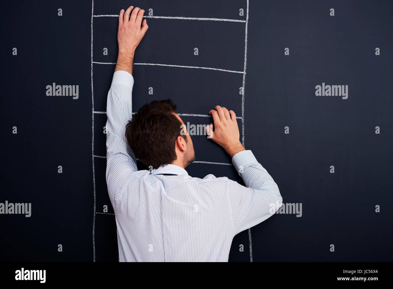 Climbing the ladder of success Stock Photo - Alamy