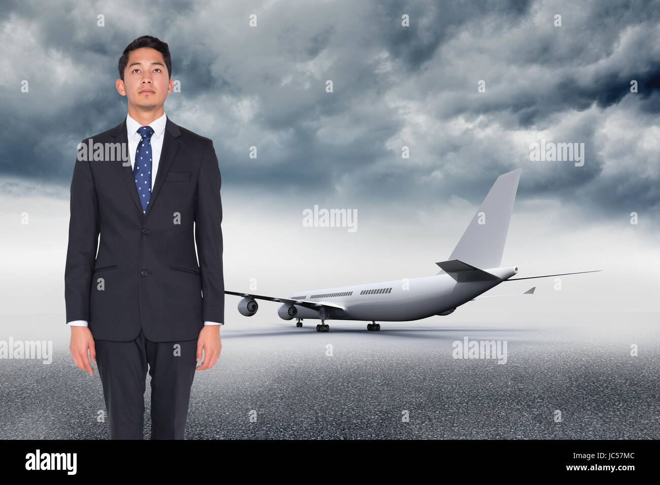 Composite image of serious businessman looking up Stock Photo - Alamy