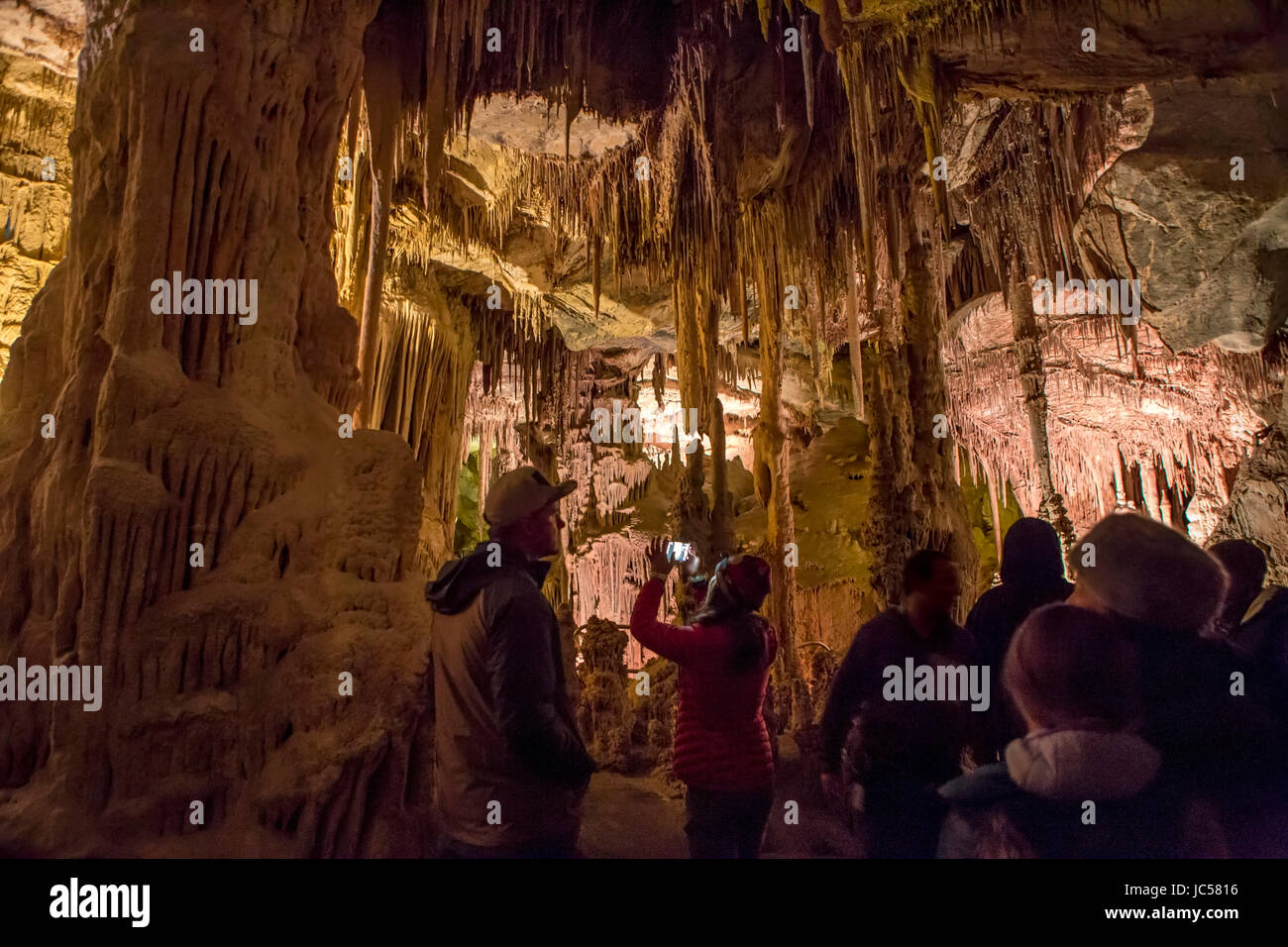 Visitors enjoy the stunning beauty of Lehman Caves on their tour Stock ...