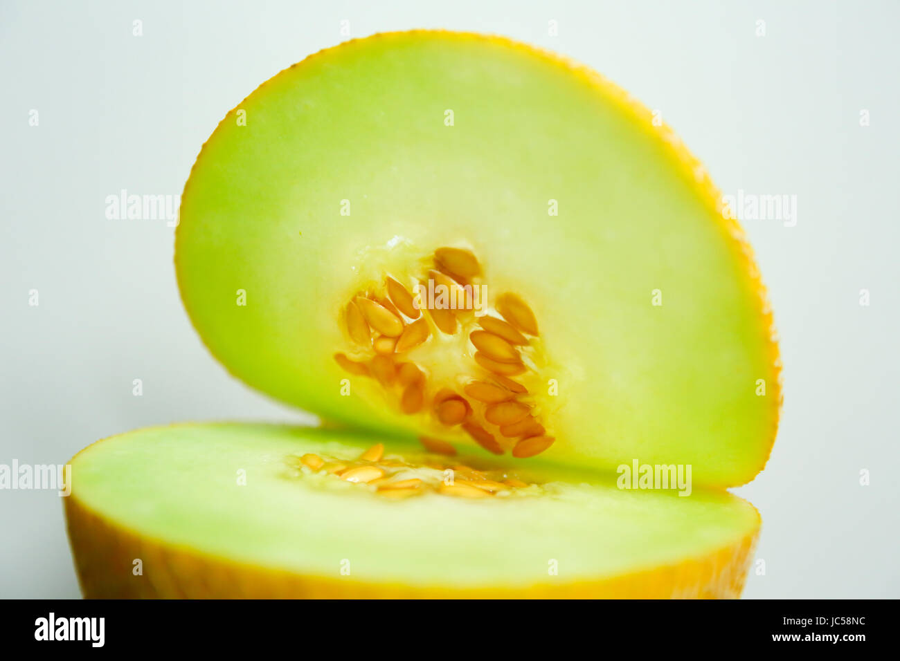 Galia melon - whole fruit and cut Stock Photo - Alamy