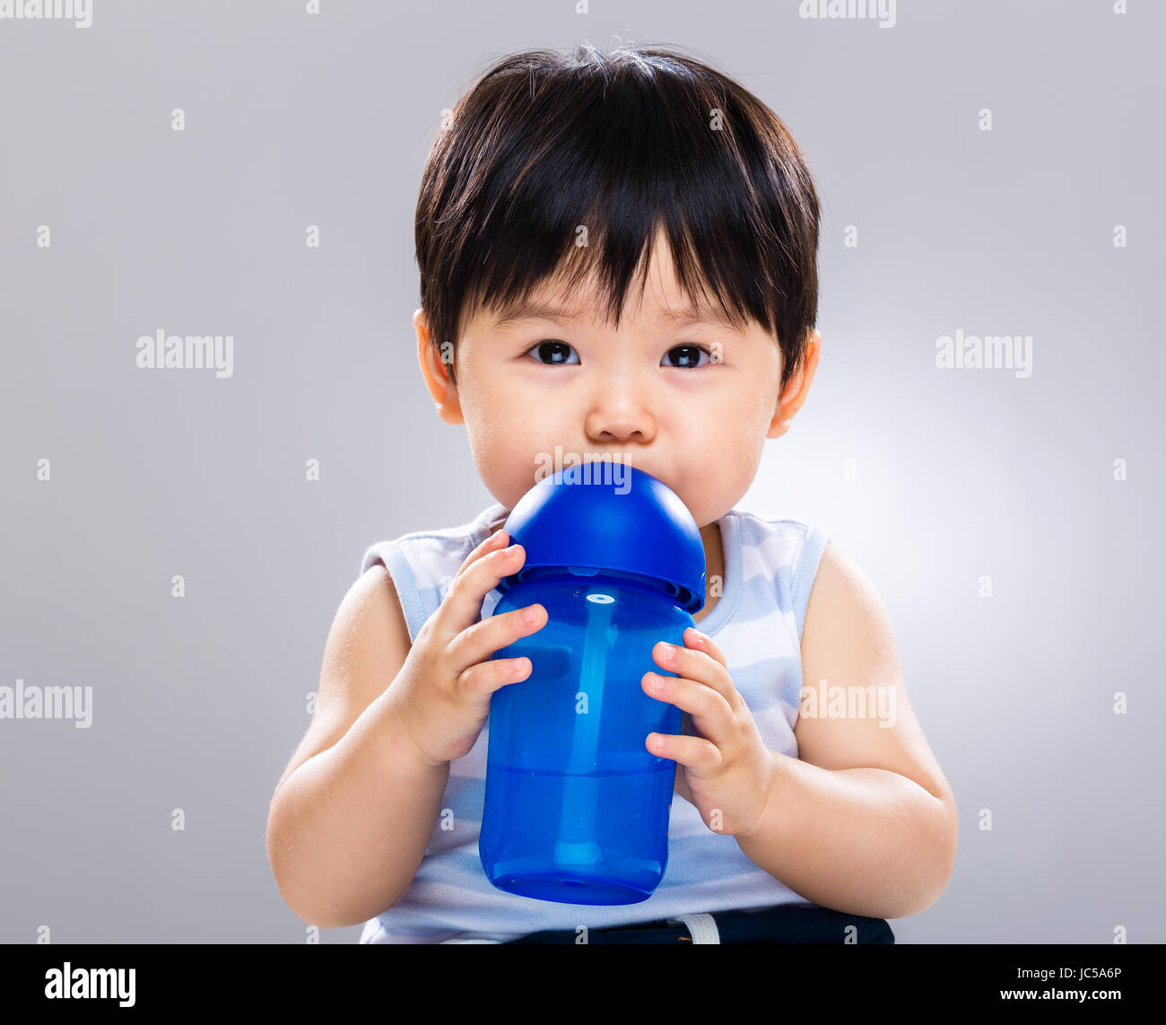 Baby drink with water bottle Stock Photo - Alamy