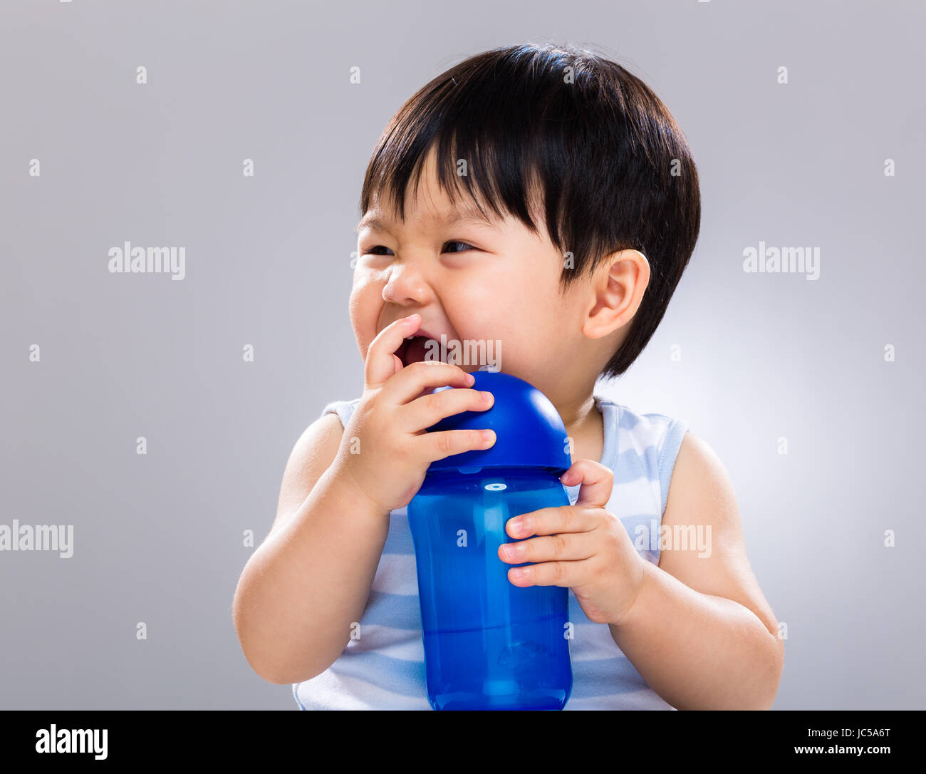Little boy drinking water Stock Photo - Alamy