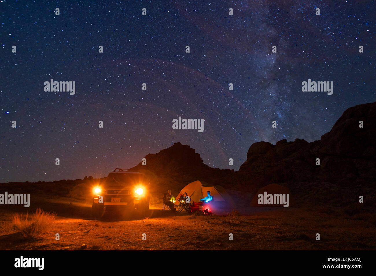 Camping under stars Stock Photo - Alamy