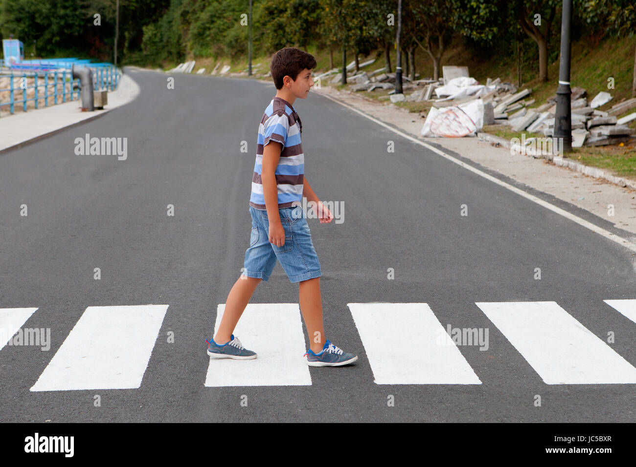 Child walk through traffic hi-res stock photography and images - Alamy
