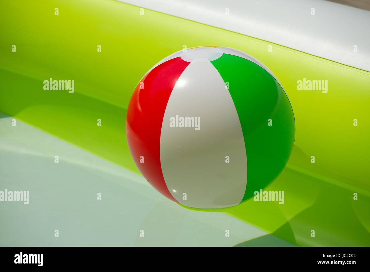 Rubber ball in a swimming pool Stock Photo - Alamy