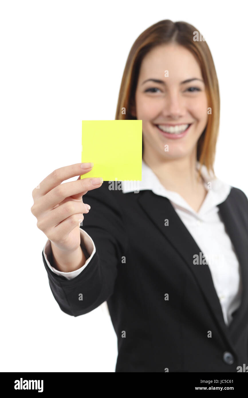 Beautiful businesswoman showing a blank yellow paper note isolated on a ...