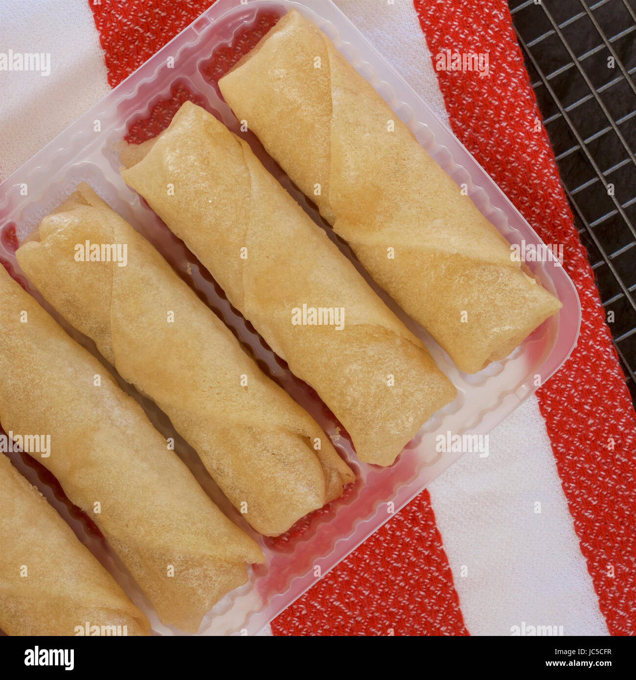 Chinese spring rolls in wrapping Stock Photo - Alamy