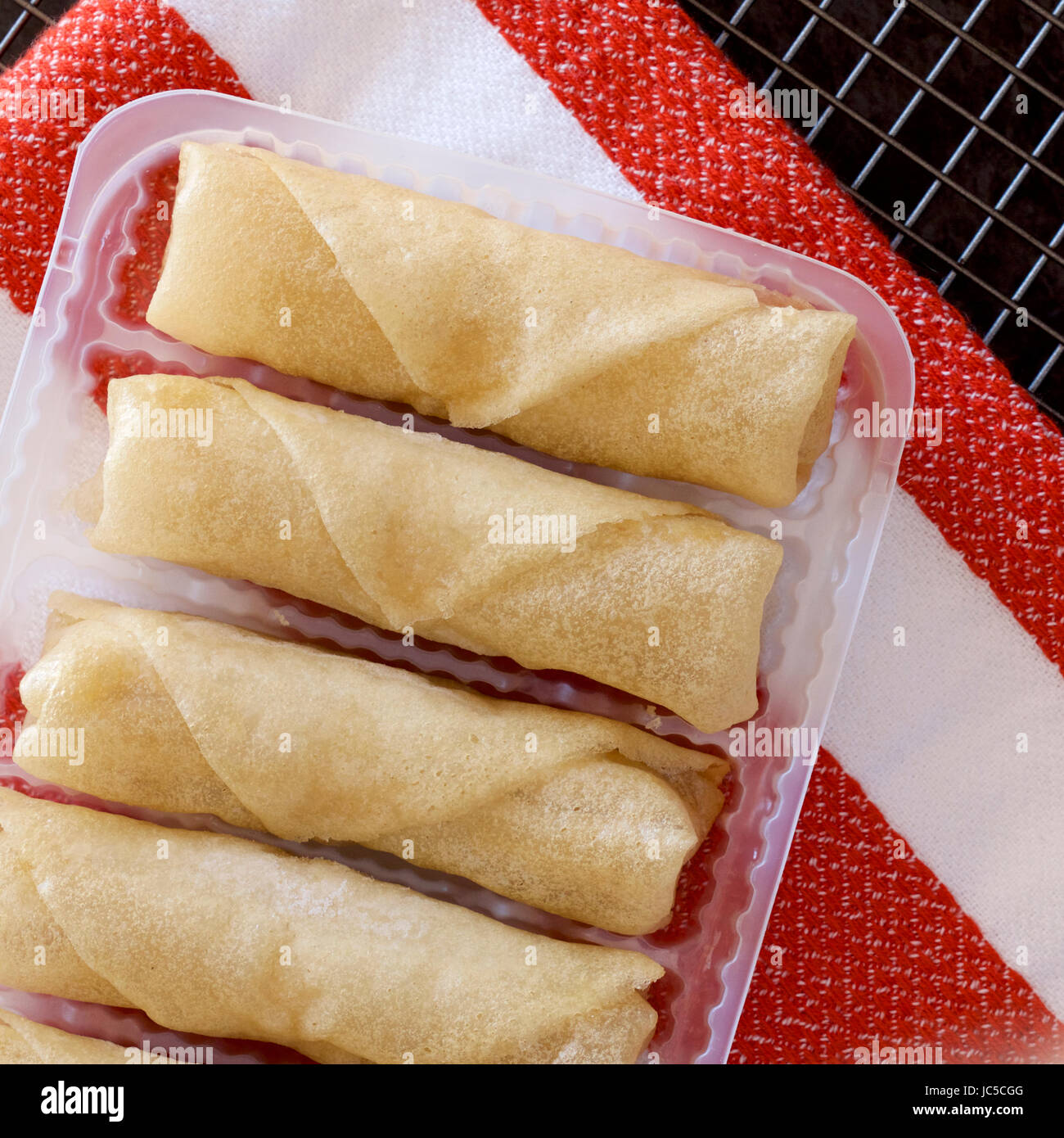 Chinese spring rolls in wrapping Stock Photo - Alamy