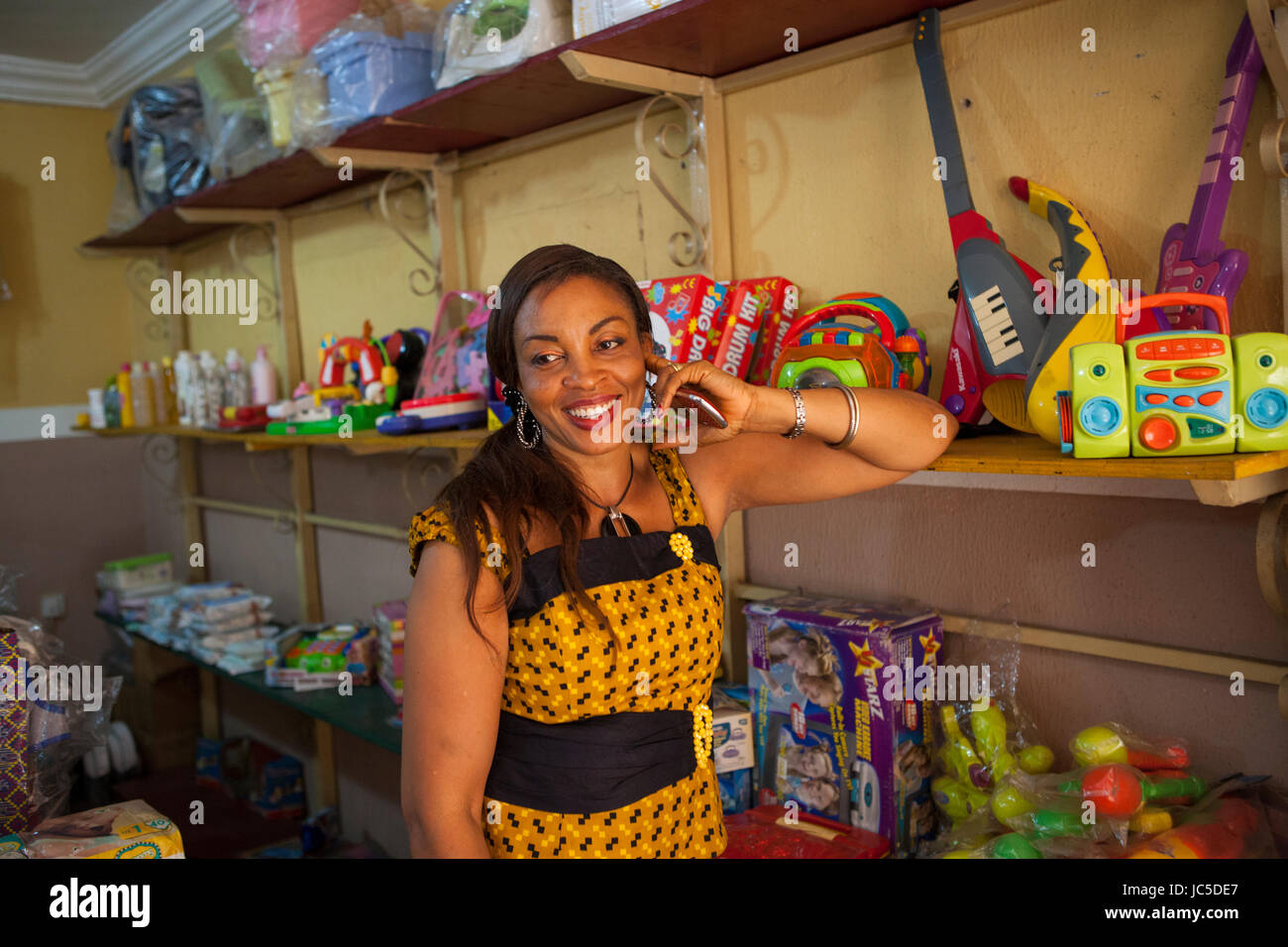 A female shop keeper, Nigeria, Africa Stock Photo - Alamy