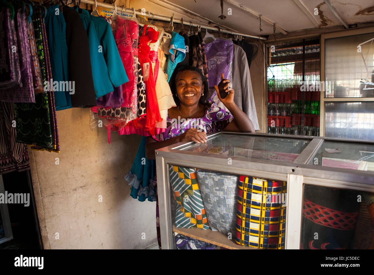 A female shop keeper, Nigeria, Africa Stock Photo - Alamy