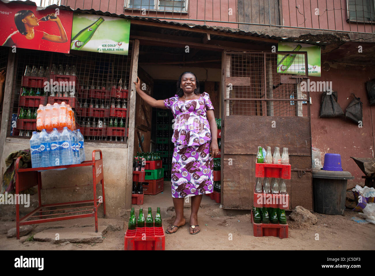 A female shop keeper, Nigeria, Africa Stock Photo - Alamy