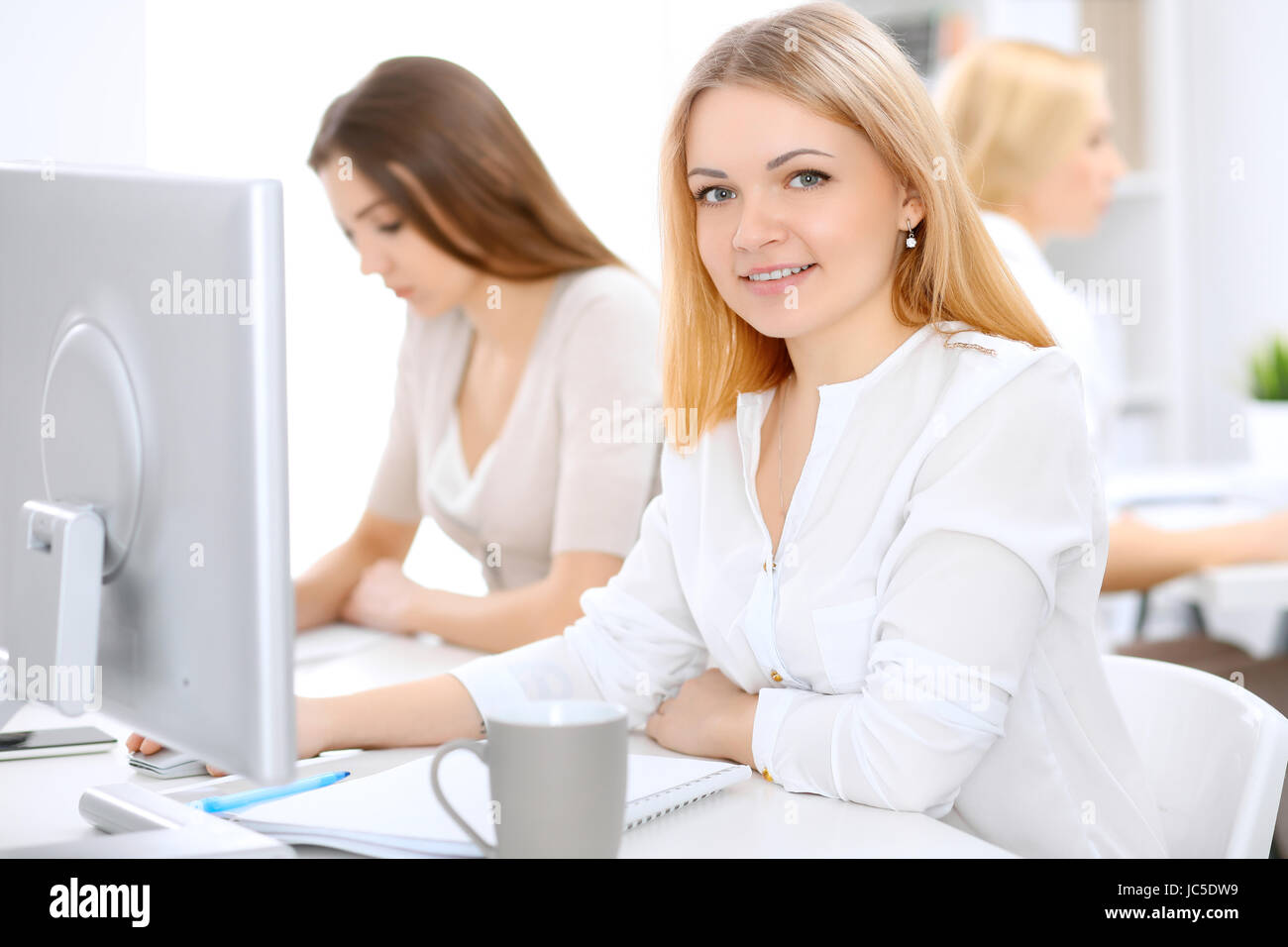 Face of beautiful business woman in office Stock Photo - Alamy