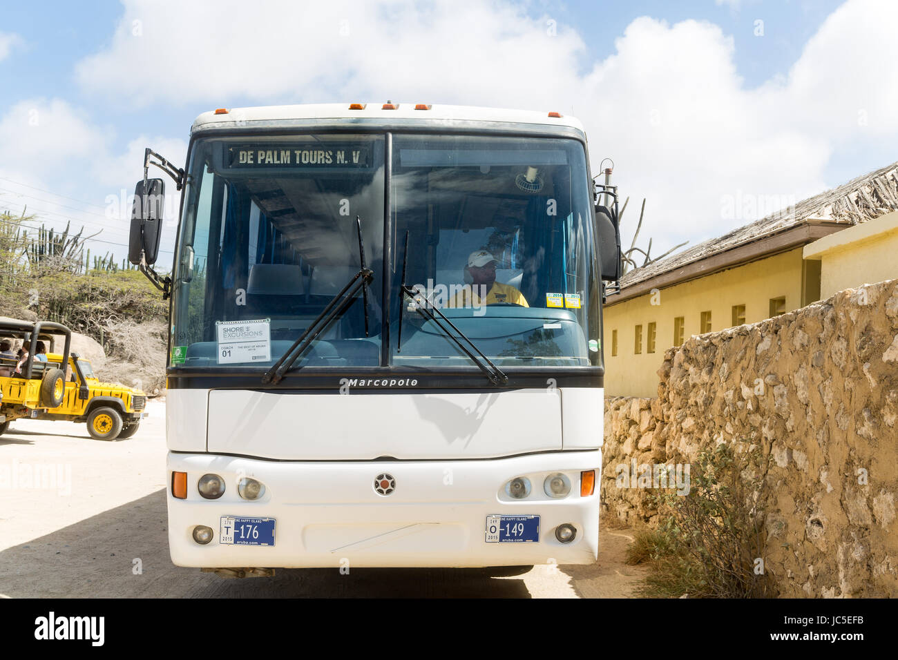 De Palm Tour Bus on Aruba Road Stock Photo - Alamy