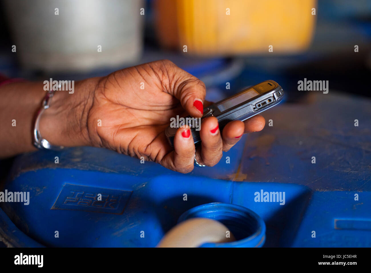 A woman using her mobile phone, Nigeria, Africa Stock Photo - Alamy