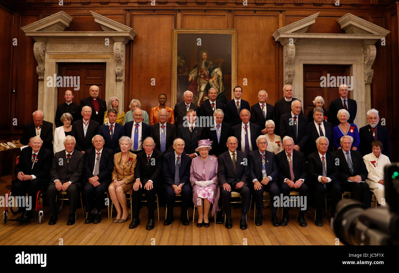 Queen Elizabeth II and the Duke of Edinburgh during a photo with ...
