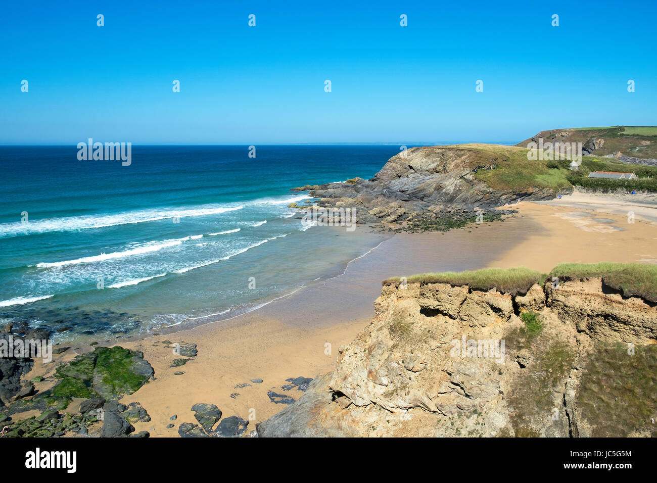 sunny weather and blue sky at church cove gunwalloe in cornwall ...