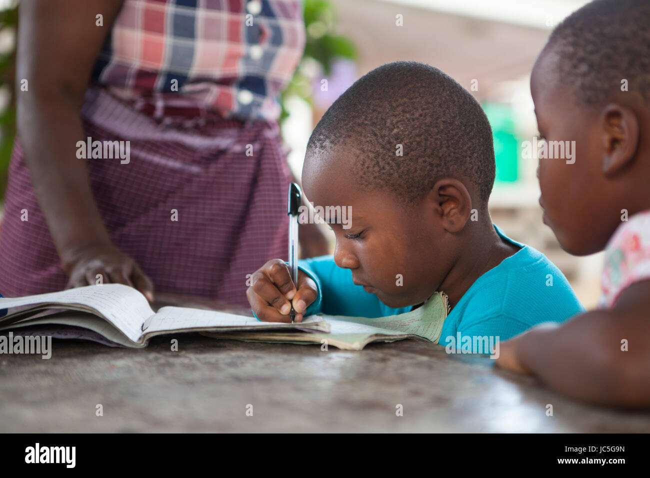 Child studying hi-res stock photography and images - Alamy
