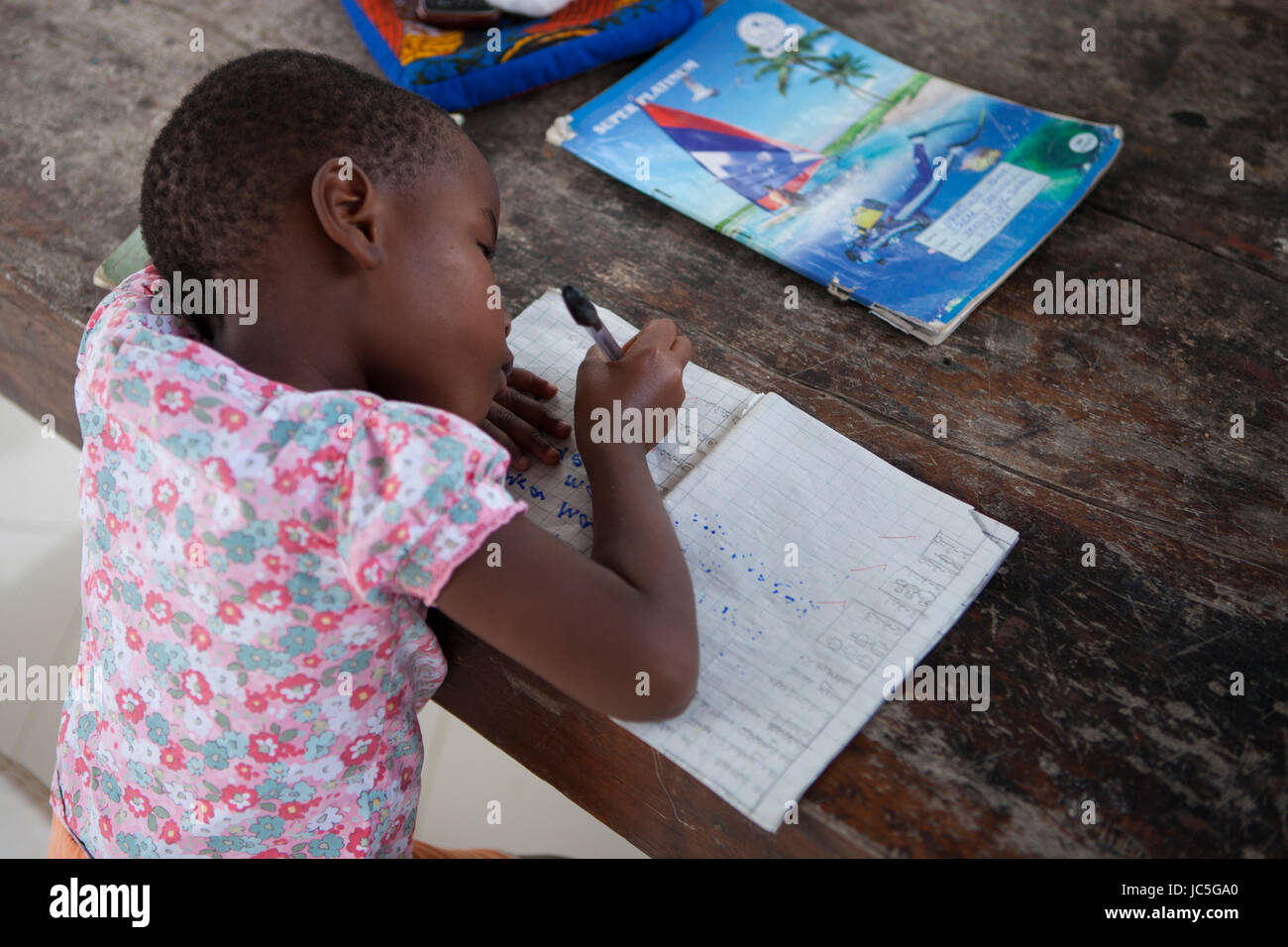 Young child studying, Tanzania, Africa Stock Photo - Alamy