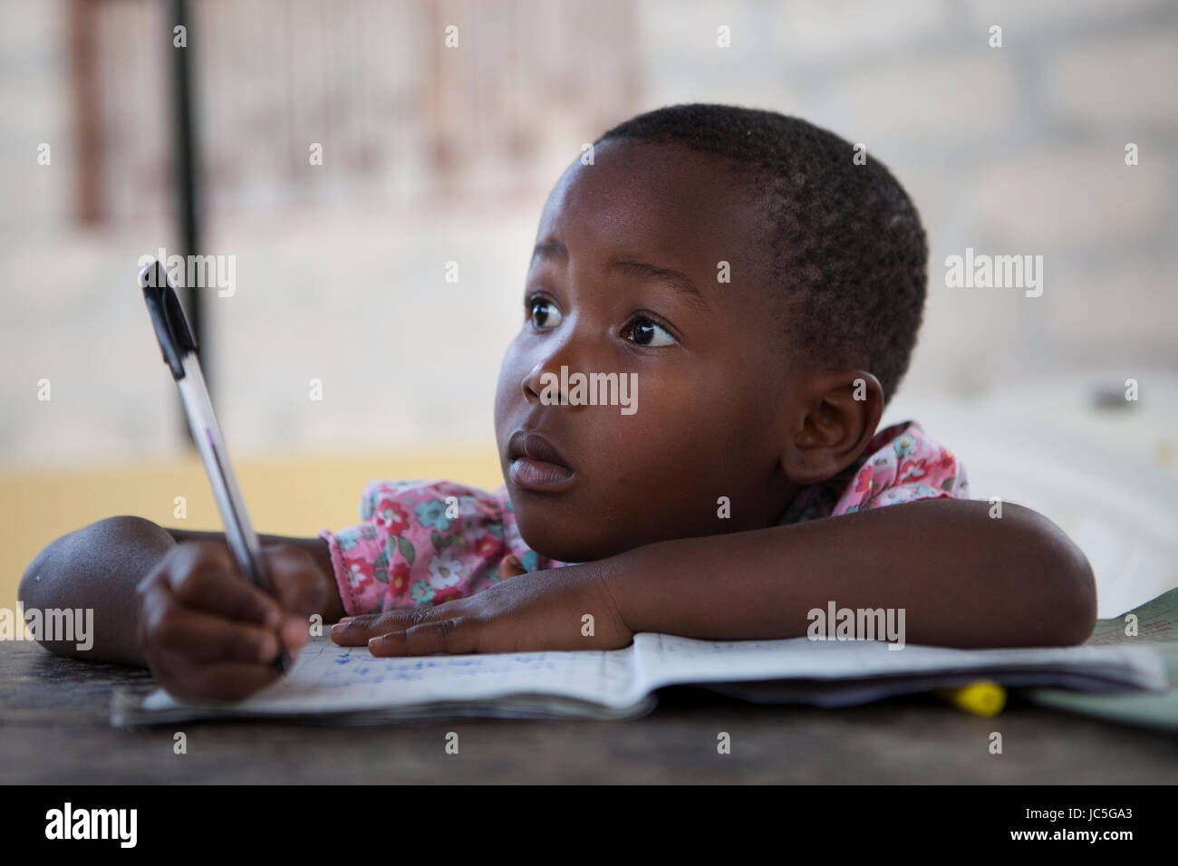 Young child studying, Tanzania, Africa Stock Photo - Alamy