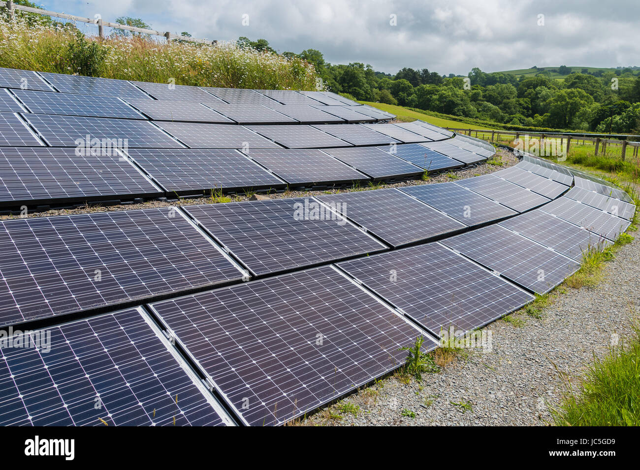 Solar panels on green hill hi-res stock photography and images - Alamy