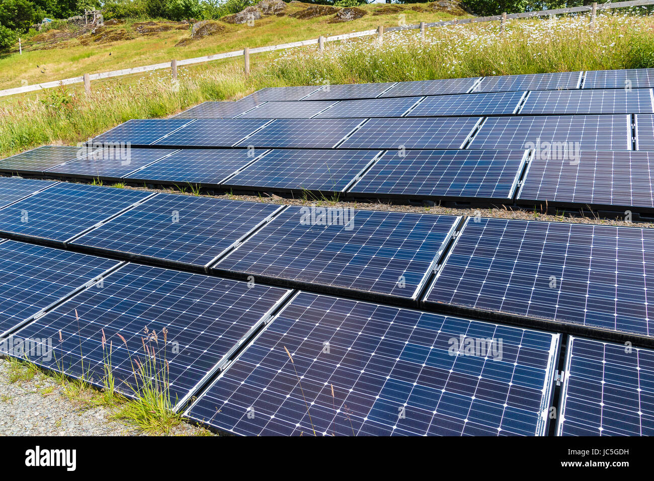 Solar panels on green hill hi-res stock photography and images - Alamy
