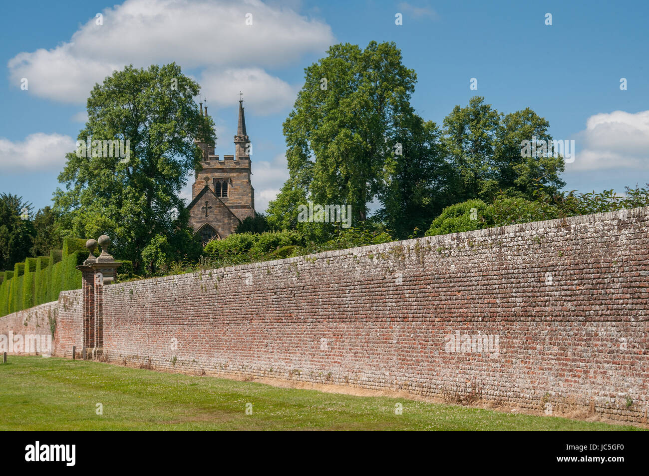 Penshurst Church in Kent, England within the Trees behind a brick stone ...