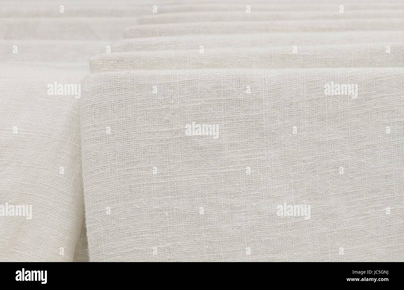 Clothing & Accessories, Stack of White Clean Cotton Fabric in A Shop ...