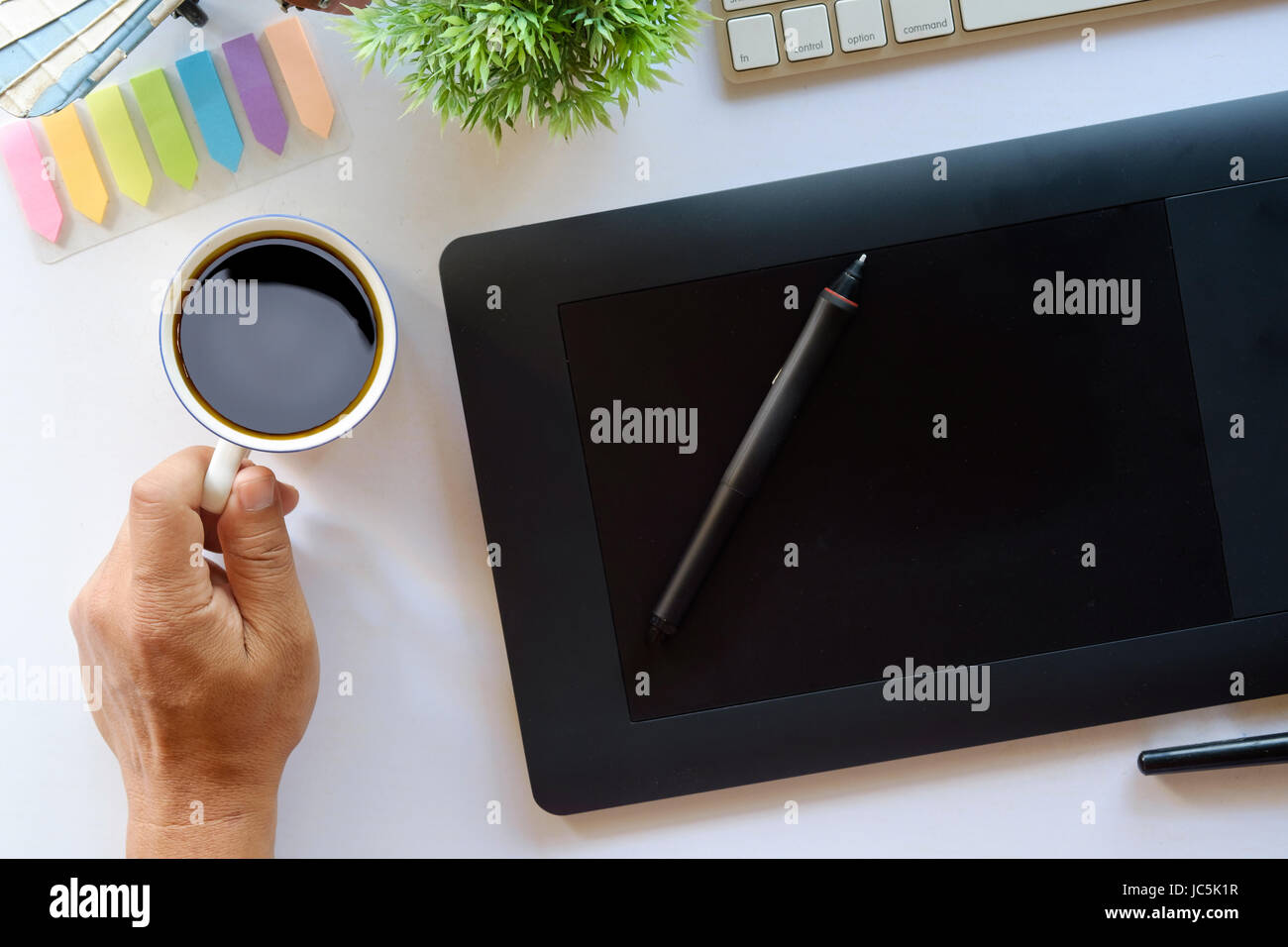 Man drawing digital pen graphics hi-res stock photography and images ...