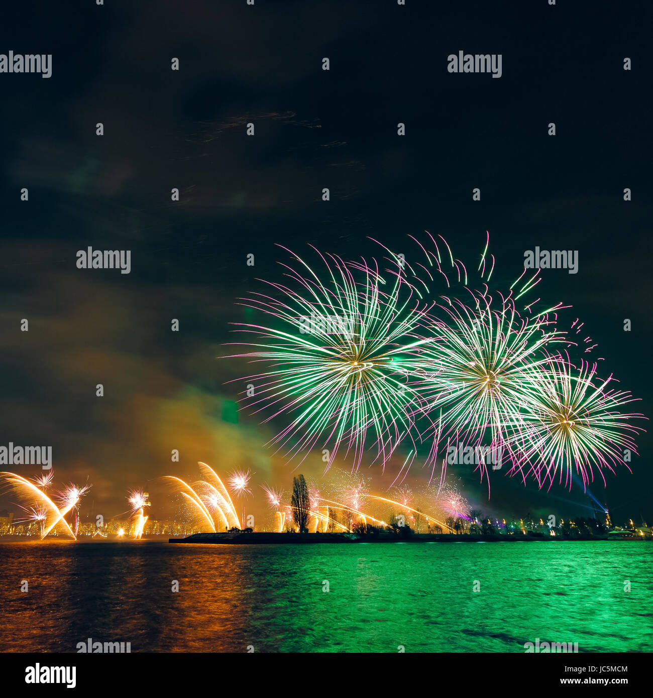 Colored New Year fireworks in centre of Riga Stock Photo - Alamy
