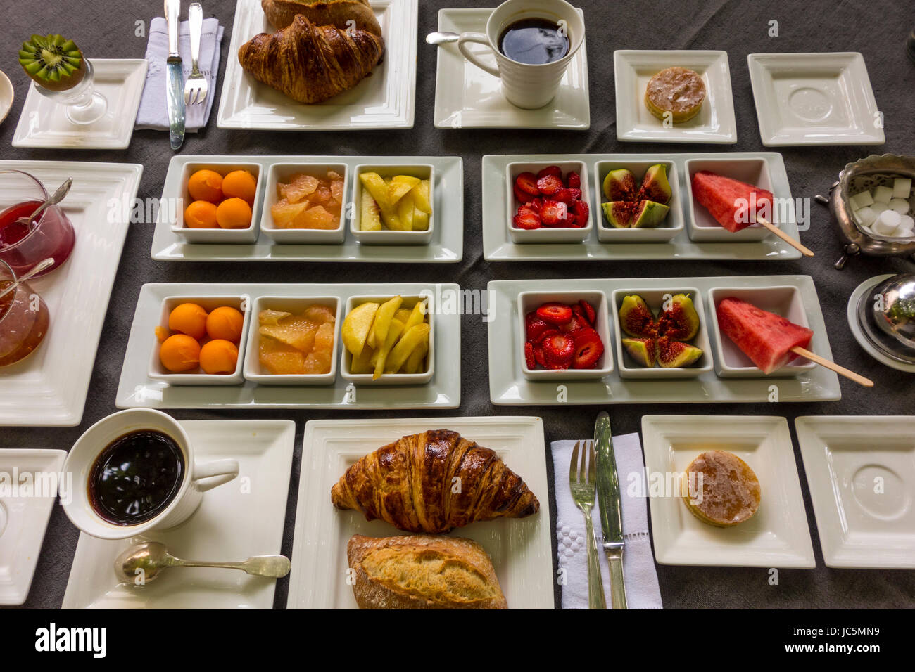 Beautifully arranged breakfast on table at a chambre d'hotes, France ...
