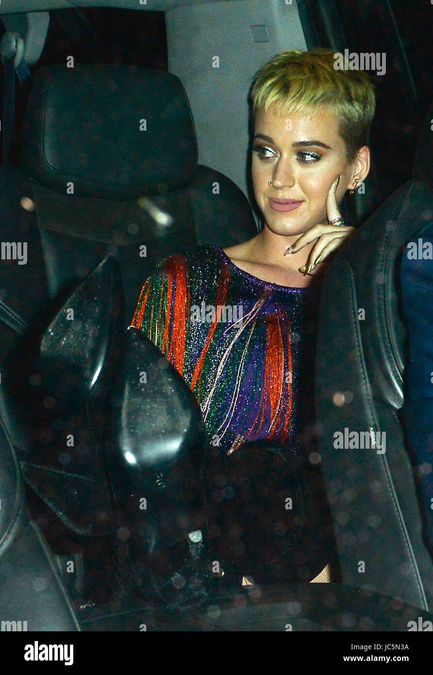 Katy Perry puts her legs up while leaving The Peppermint night club in ...