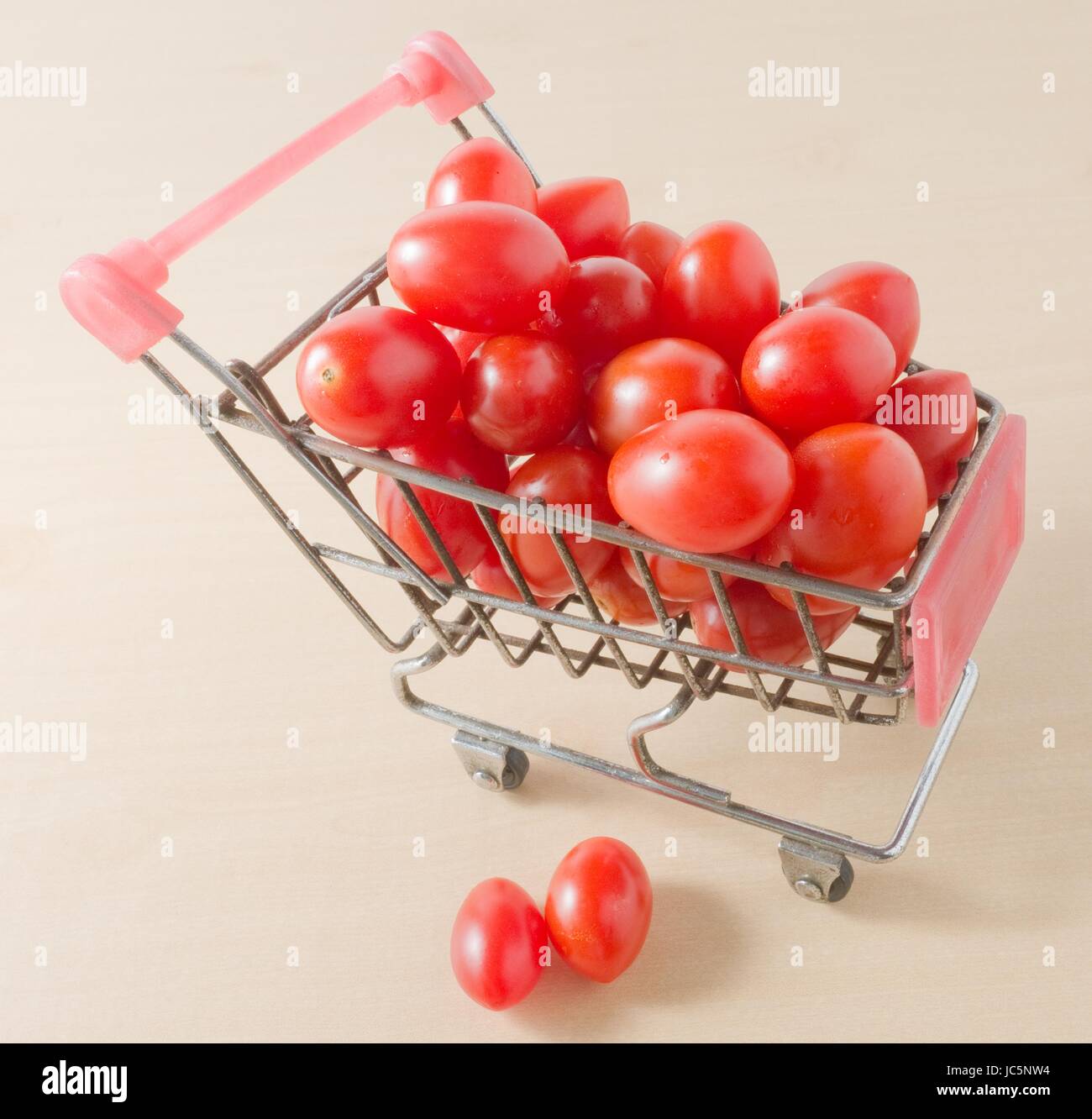 Vegetable, A Small Shopping Cart Full with Fresh Ripe Red Grape Tomatoes or Cherry Tomatoes ...