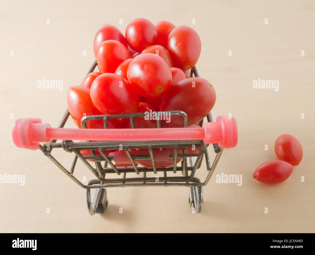 Vegetable, A Small Shopping Cart Full with Ripe Red Grape Tomatoes or Cherry Tomatoes Stock ...