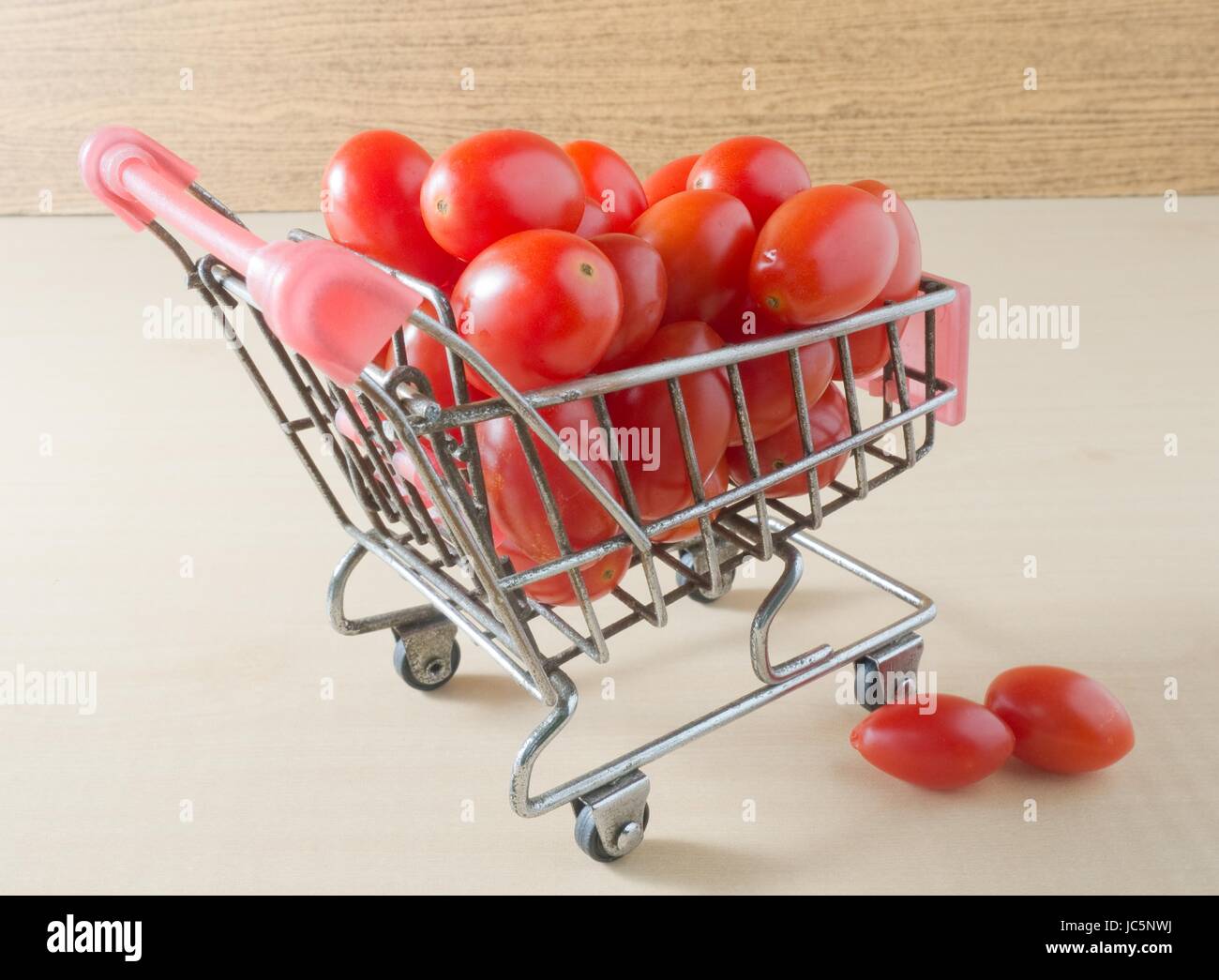 Vegetable, A Small Shopping Cart Full with Fresh Red Grape Tomatoes or Cherry Tomatoes Stock ...