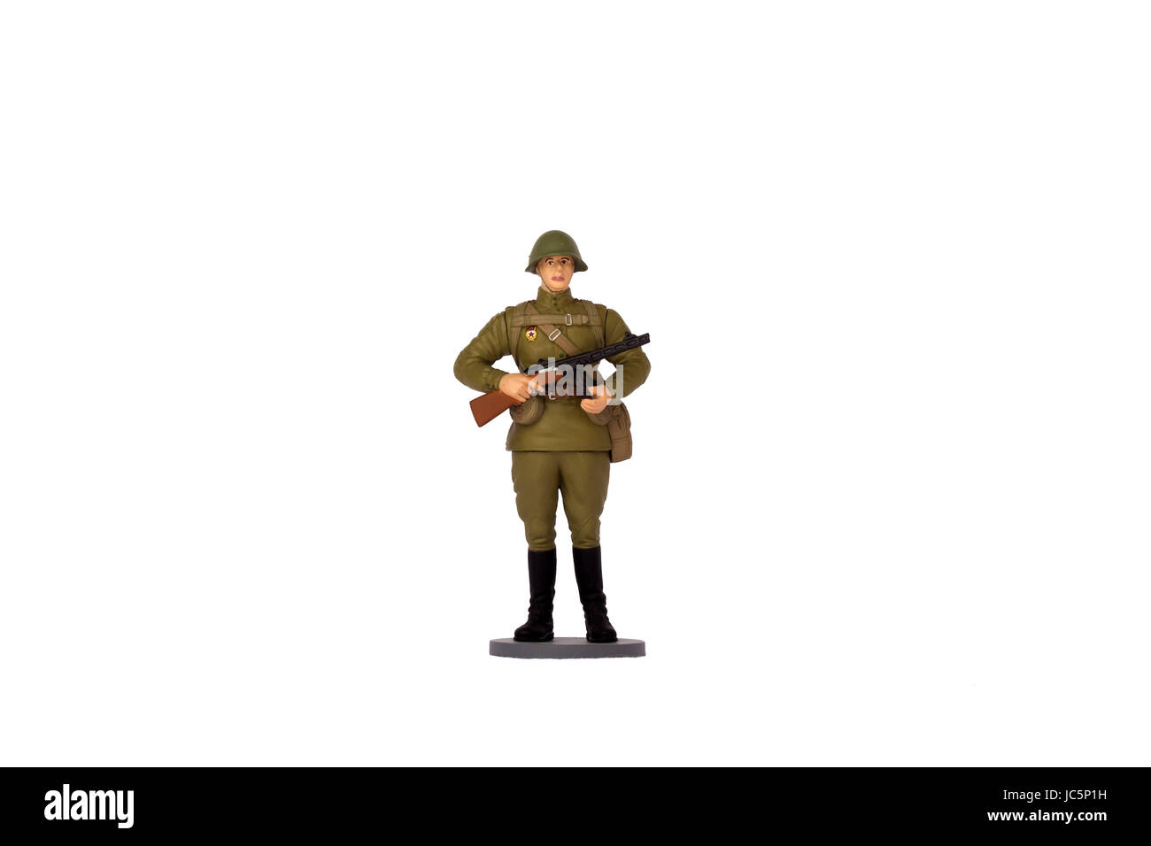 toy figure of a soldier with a gun on a white background Stock Photo ...