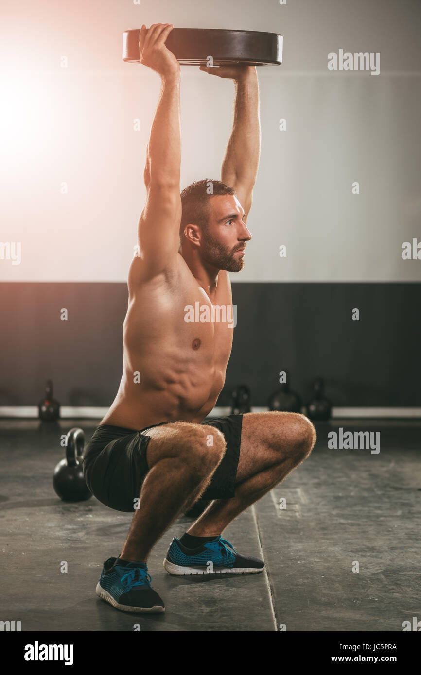 Dumbbell squats hi-res stock photography and images - Alamy