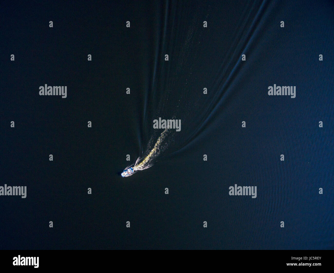 A speedboat seen at Mazvikadei dam in Zimbabwe Stock Photo - Alamy