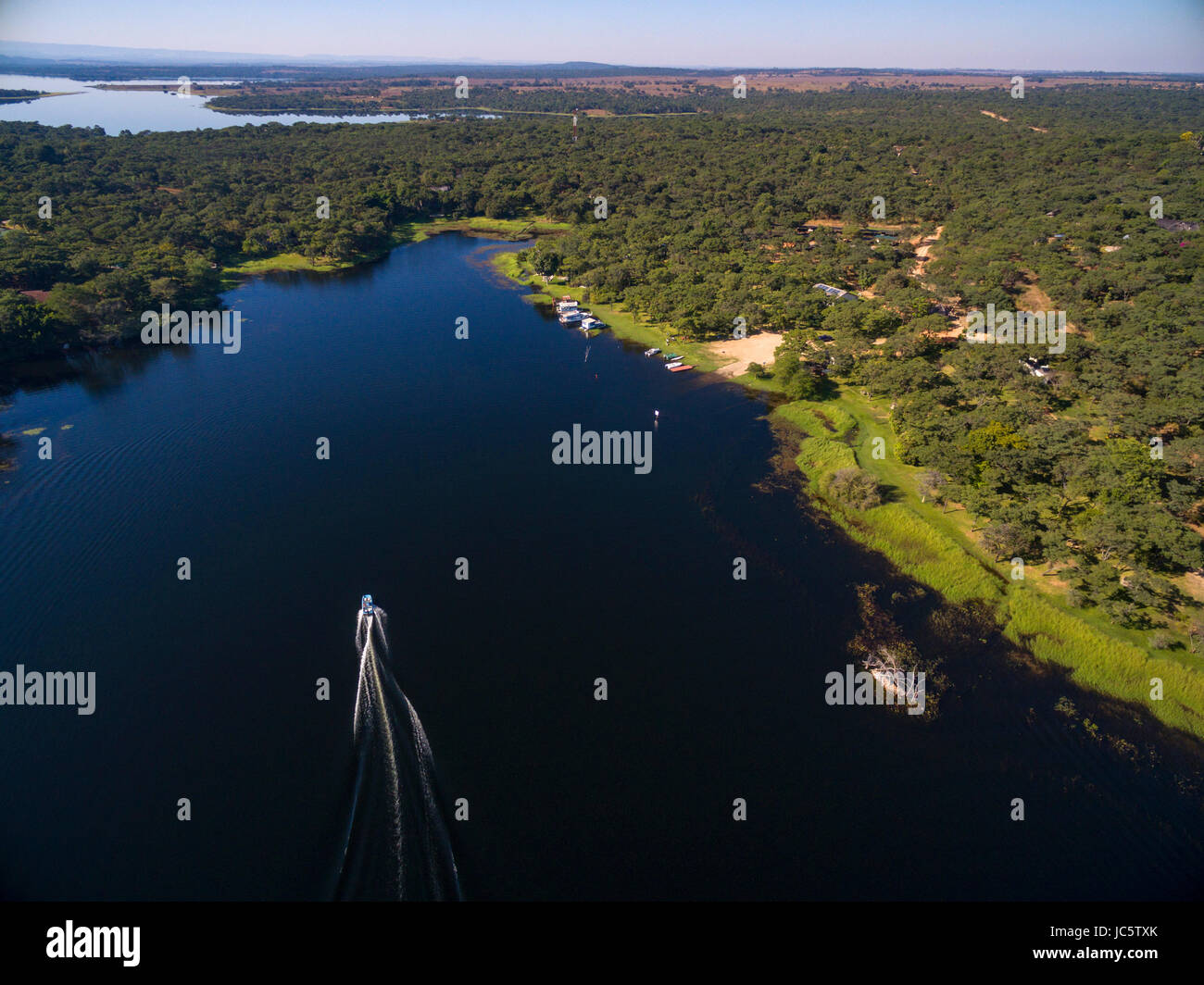 A speedboat seen at Mazvikadei dam in Zimbabwe Stock Photo - Alamy
