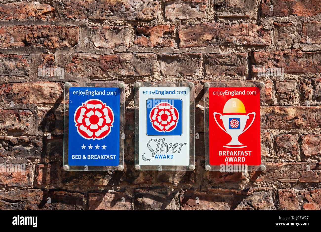 English tourist board awards award sign signs on wall outside bed and ...