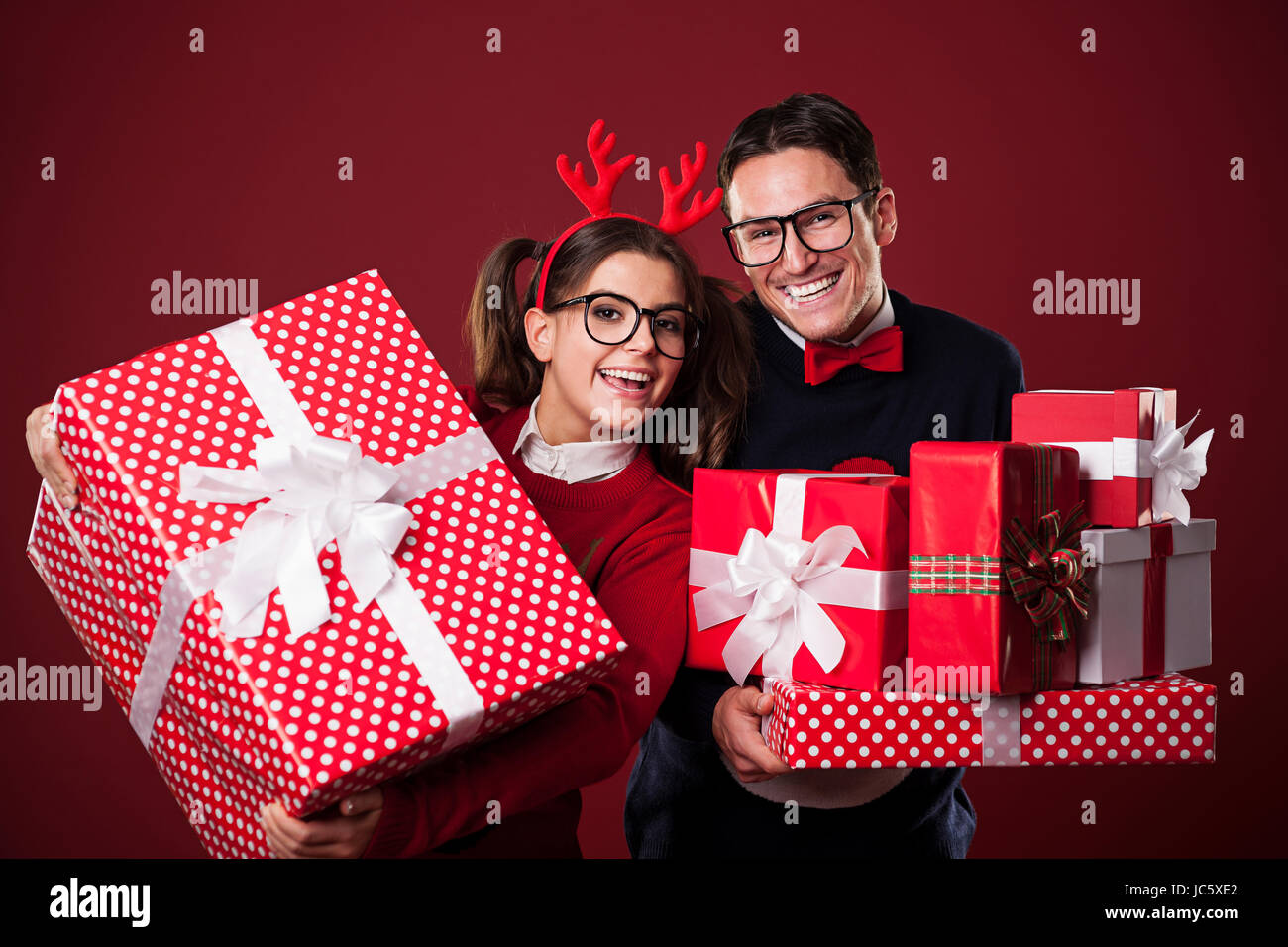 Time to opening christmas presents Stock Photo - Alamy