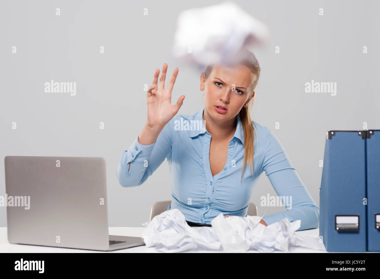 Businesswoman throwing paper table hi-res stock photography and images ...