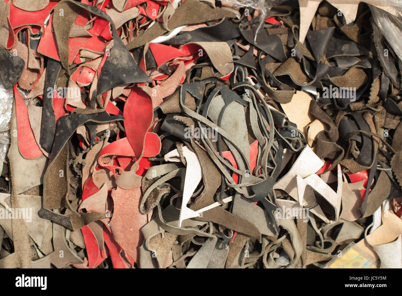 Assorted pieces of skin Leather Garbage. Waste. Refuse Stock Photo - Alamy