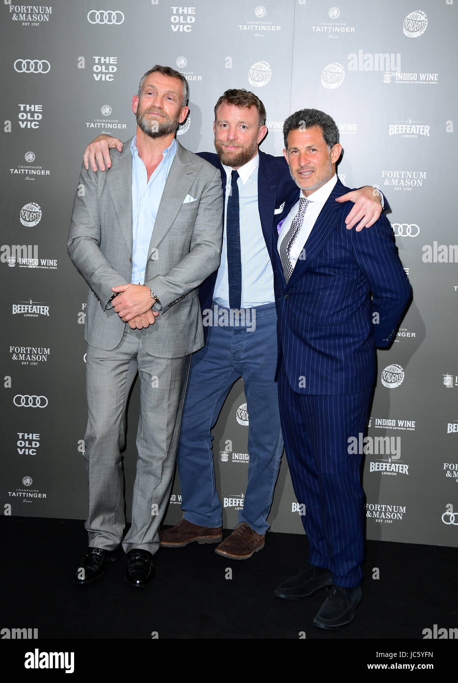 Guy Richie (centre) and Josh Berger (left) arriving at the Summer Party ...