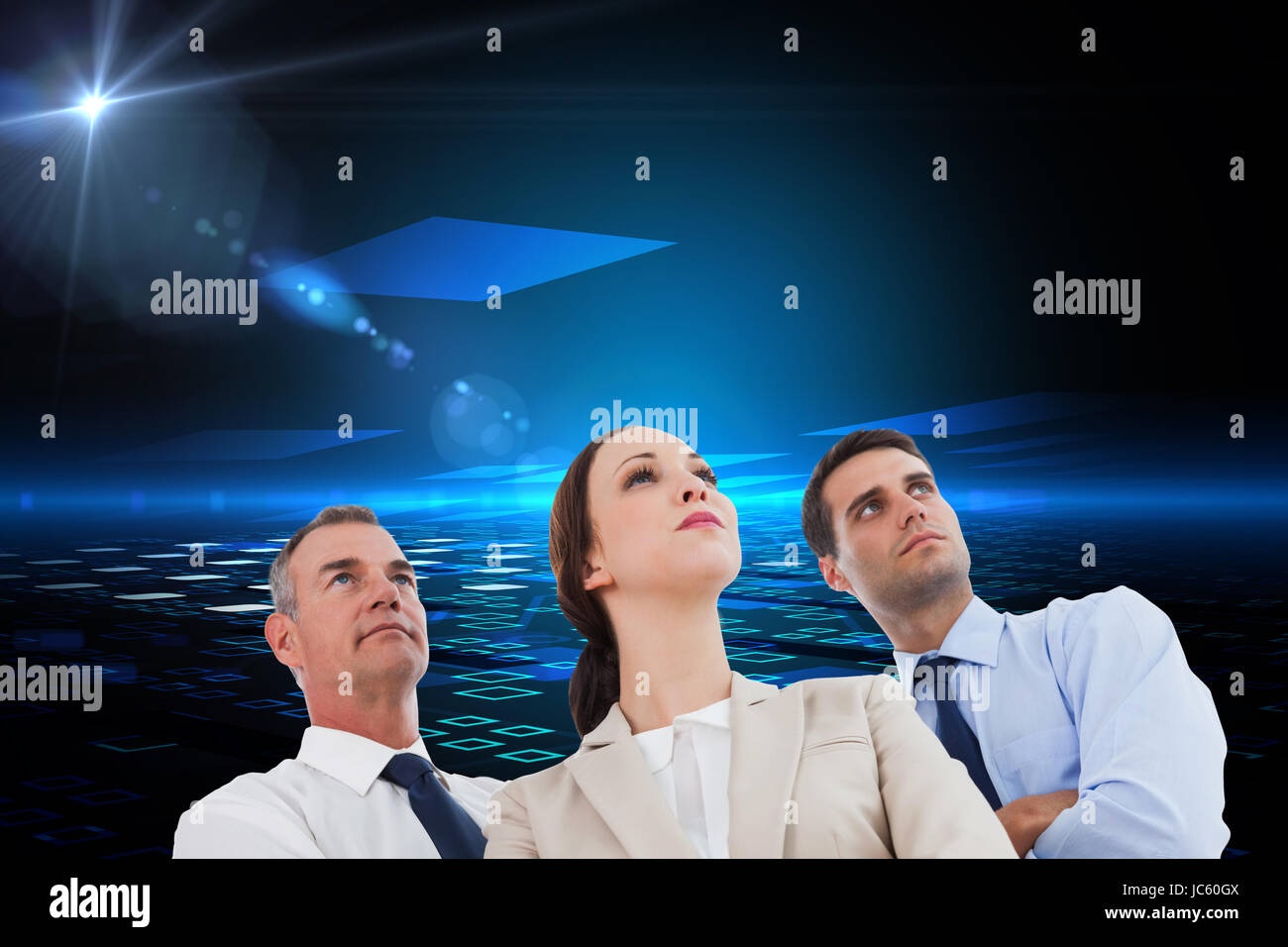Composite image of serious work team posing together looking away on ...