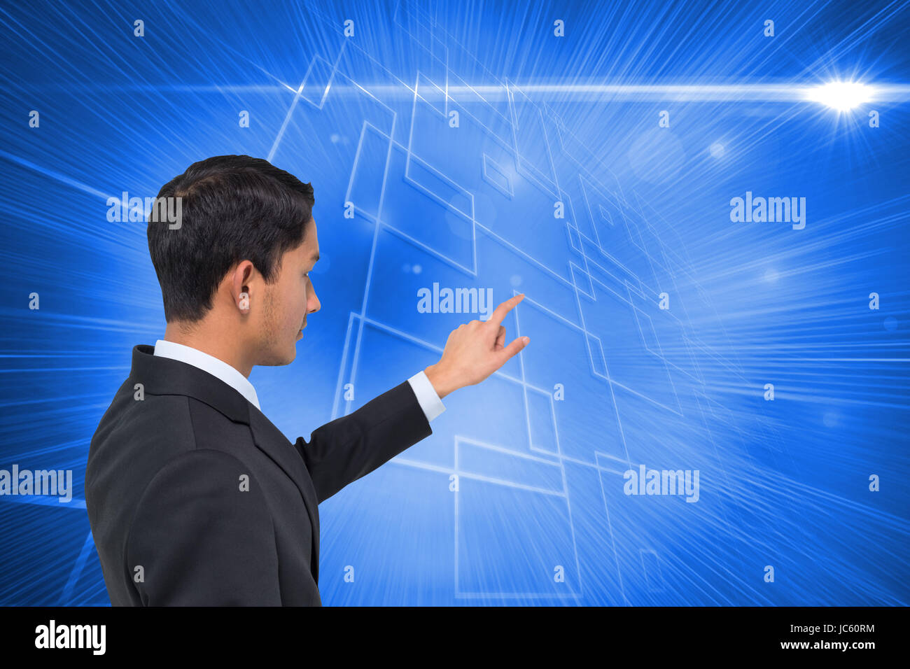 Composite image of stern asian businessman pointing Stock Photo - Alamy