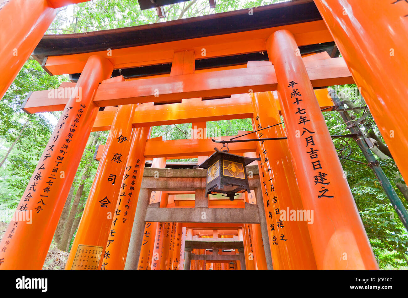 Famous red torii gate corridor in Fushimi Inari Taisha Shinto Shrine in ...