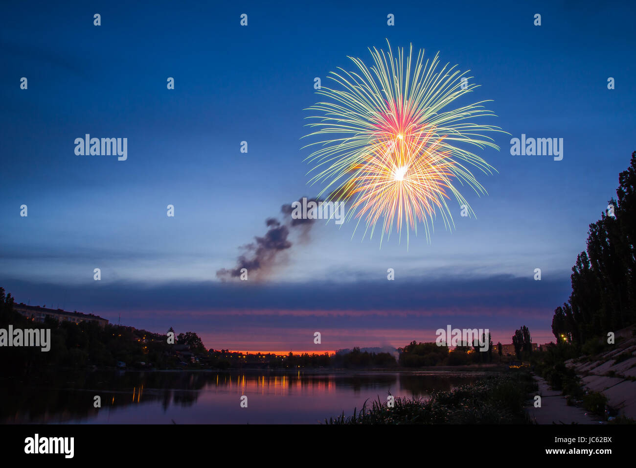 Pyrotechnics over city silhouette hi-res stock photography and images ...
